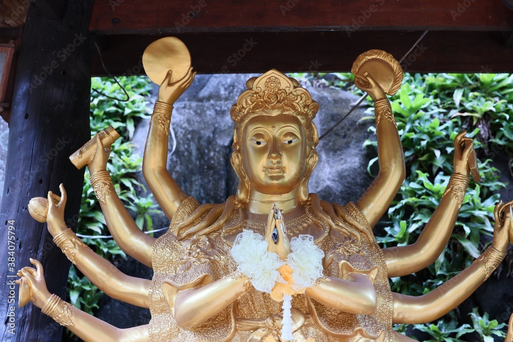 Golden statue of Lord Vishnu in a Thai temple Stock Photo | Adobe Stock