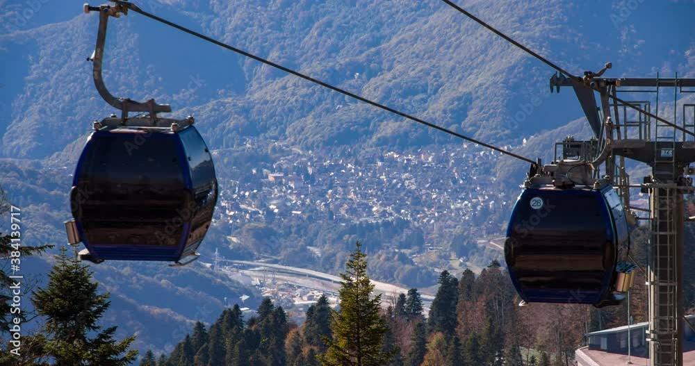 Car on the top of the mountain. The cable car moving in mountains ...