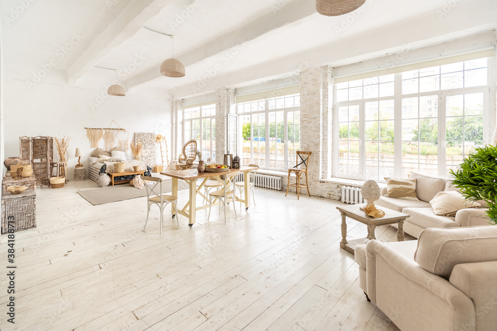 Large spacious room with a trendy loft design of sitting area. huge ...