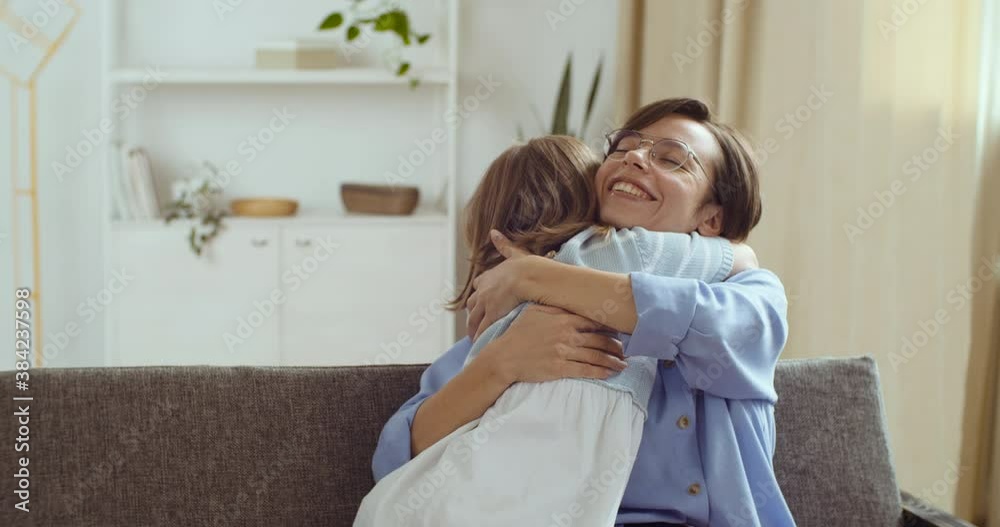 Portrait of family, happy cute affectionate adopted little kid girl ...