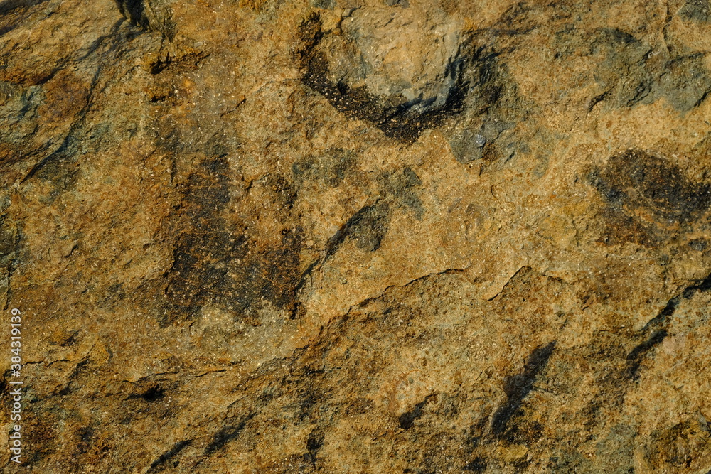 Background from a stone of igneous rock. Wallpaper made of textures of ...