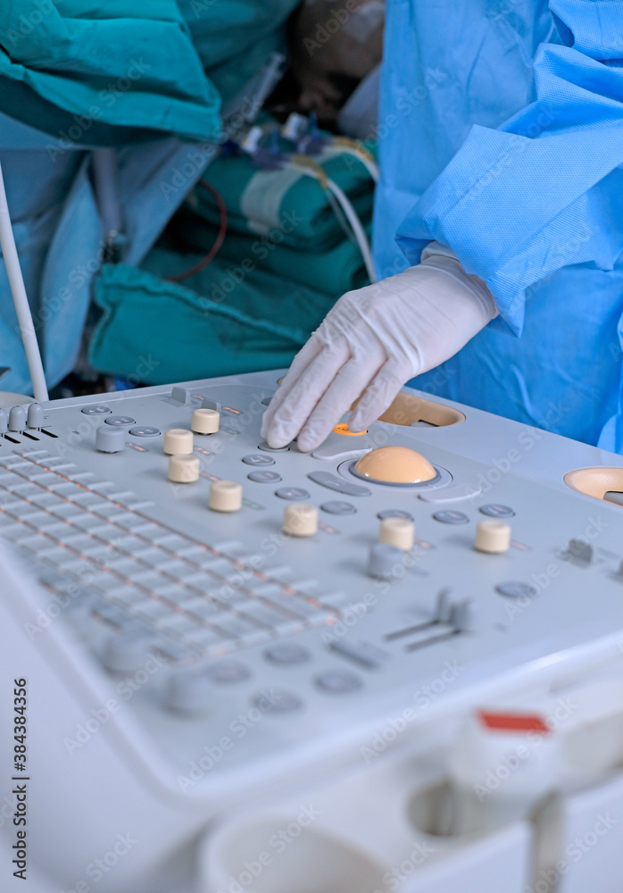 Cardiologist holding transesophageal ultrasound probe and use ...