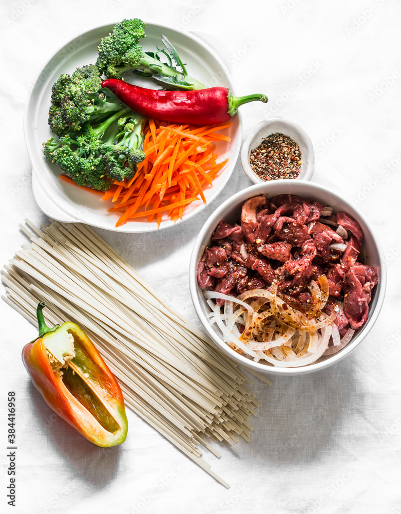 Asian style lunch cooking ingredients - beef in soy sauce, broccoli ...