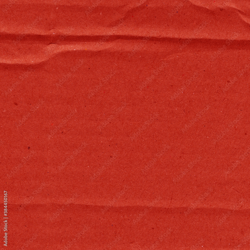 A red vintage rough sheet of carton. Recycled environmentally friendly ...