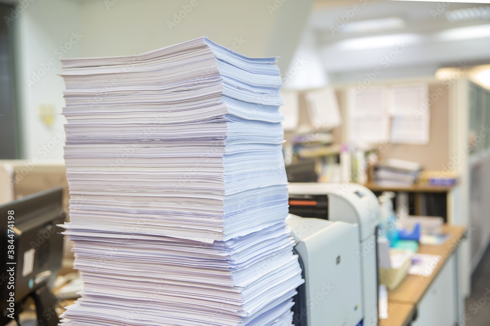 Pile of a lots reuse paper and paperwork report or printout document on ...