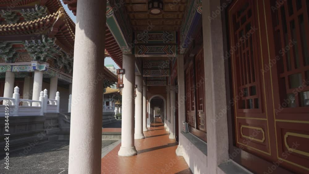 slowly moving forward the outdoor long passageway along the ancient ...