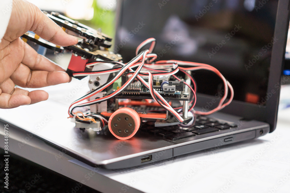 Learning STEM Education robotics project concept: Asian Student group ...