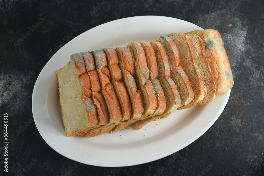 not fresh mouldy slice of stale bread. Mould on sliced bread with ...