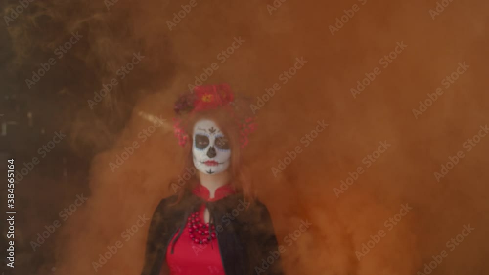 Spooky lady of dead with sugar skull and colorful wreath coming out of ...