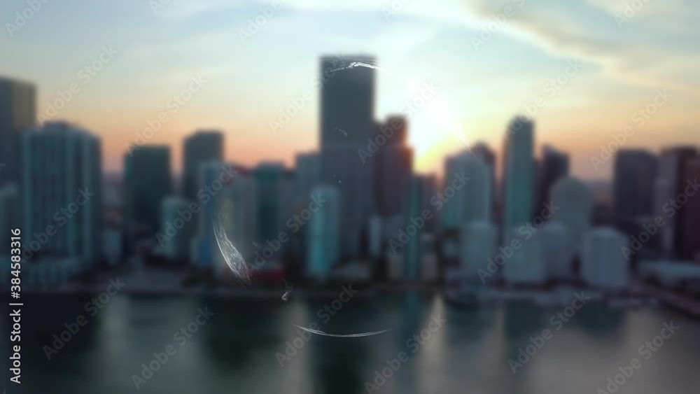 Animation of a white world map sphere spinning hologram on Miami ...
