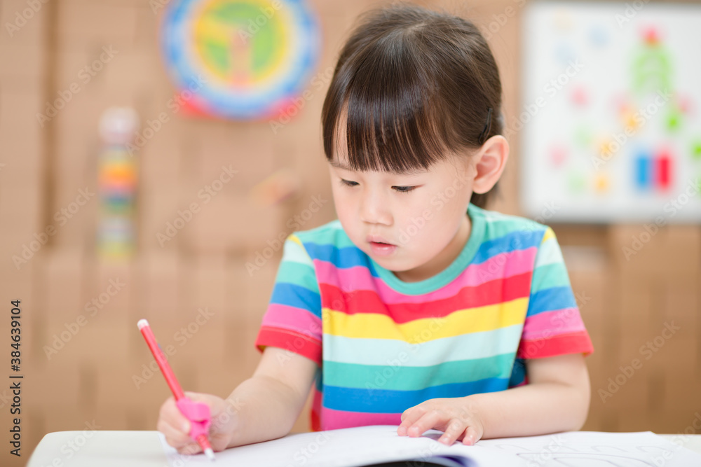 young girl practice drawing different shapes for homeschooling Stock ...