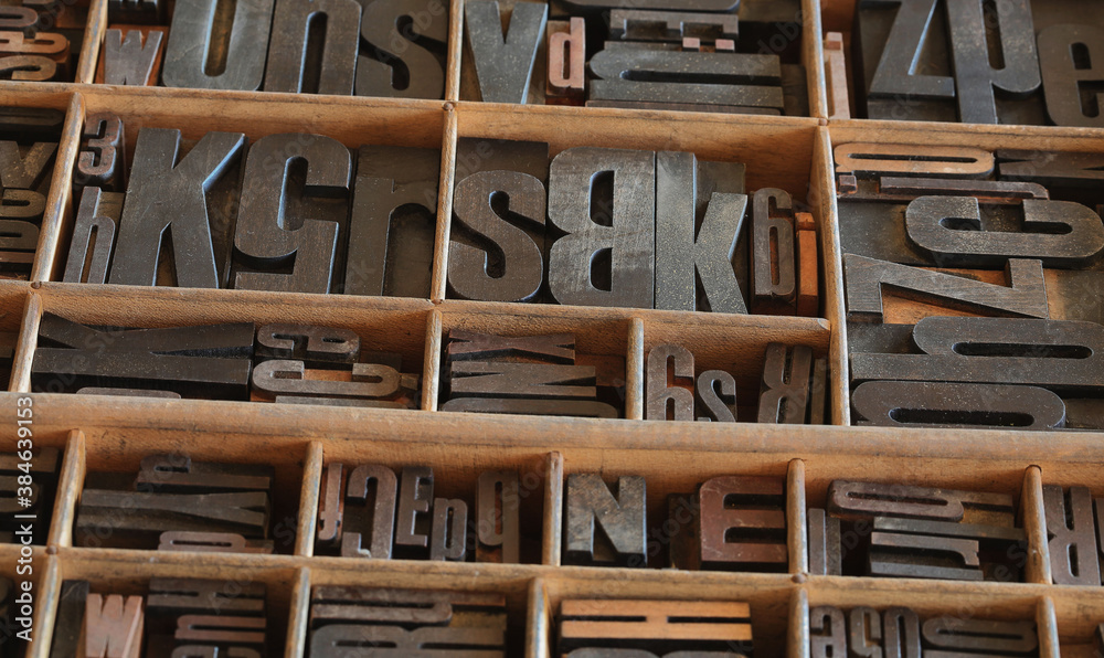 Old letterpess background. Collection of vintage block letters made of ...