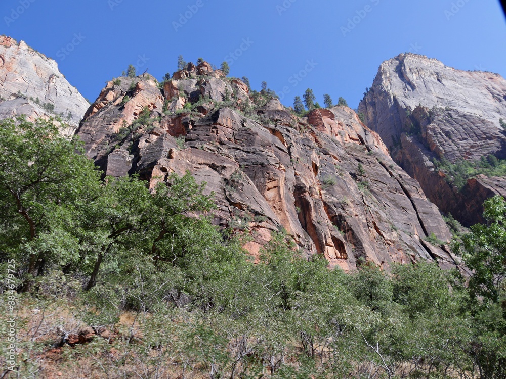 Massive mposing rocks and steep sandstone cliffs at Zion National Park ...