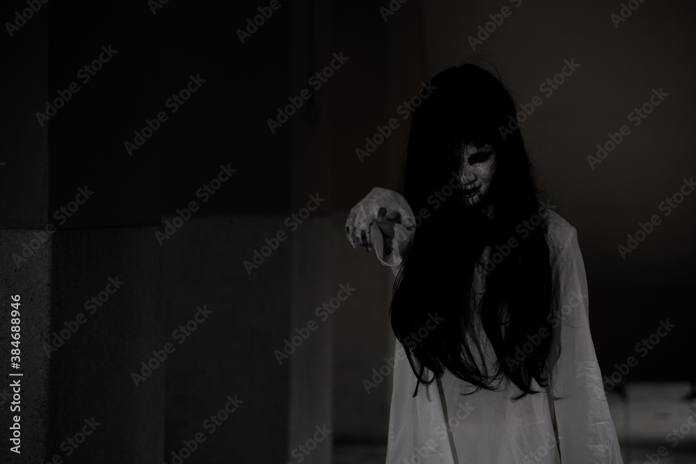 Horror woman ghost creepy standing showing hand at house, halloween day ...