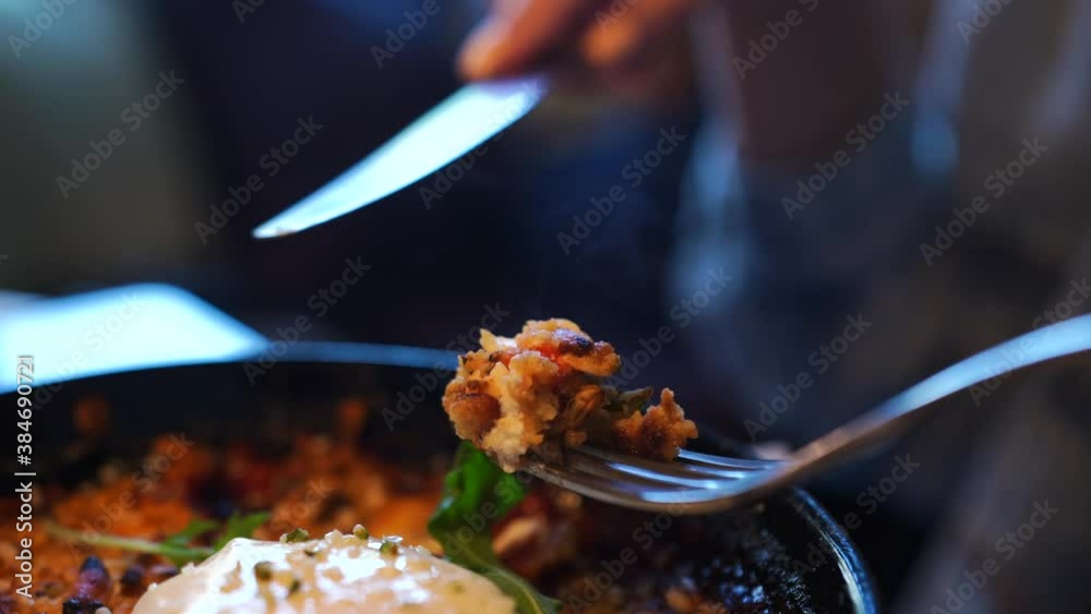 Girl, food blogger, holds hot portion rice tomato paste fork, points ...