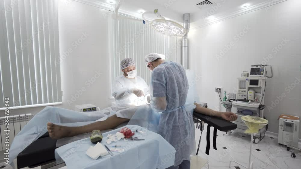 Gallbladder removal operation in the operation theatre. Action. Doctors ...