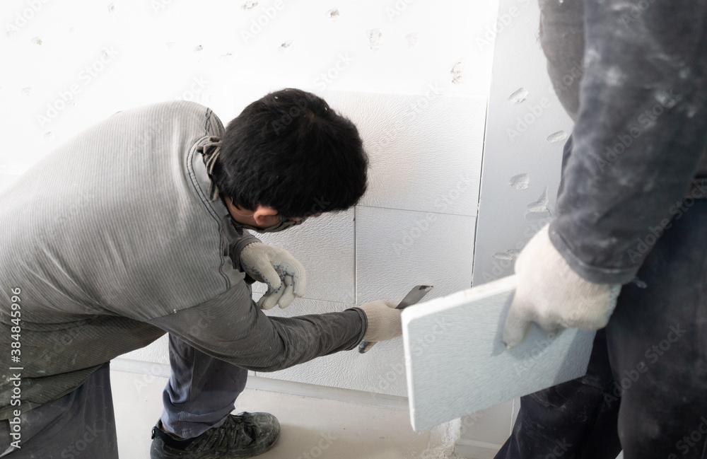installation of gypsum boards on the wall in the apartment Stock Photo ...