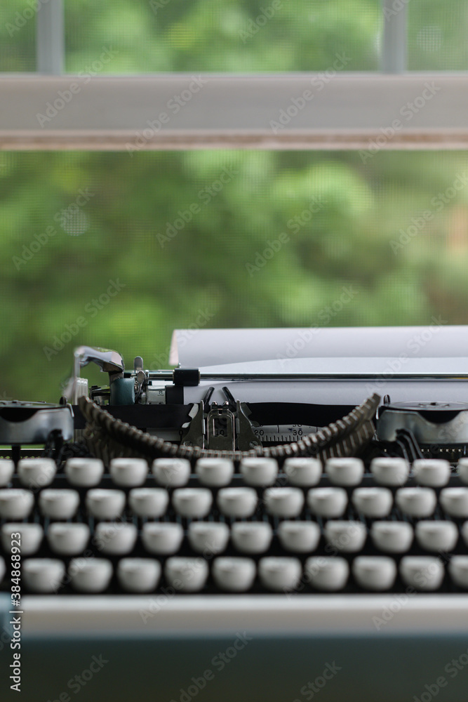 Blank page in typewriter Stock Photo | Adobe Stock