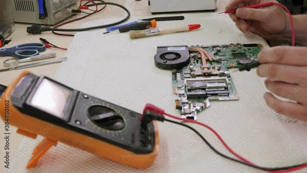 Close-up image of technician man hand measuring electrical voltage of ...