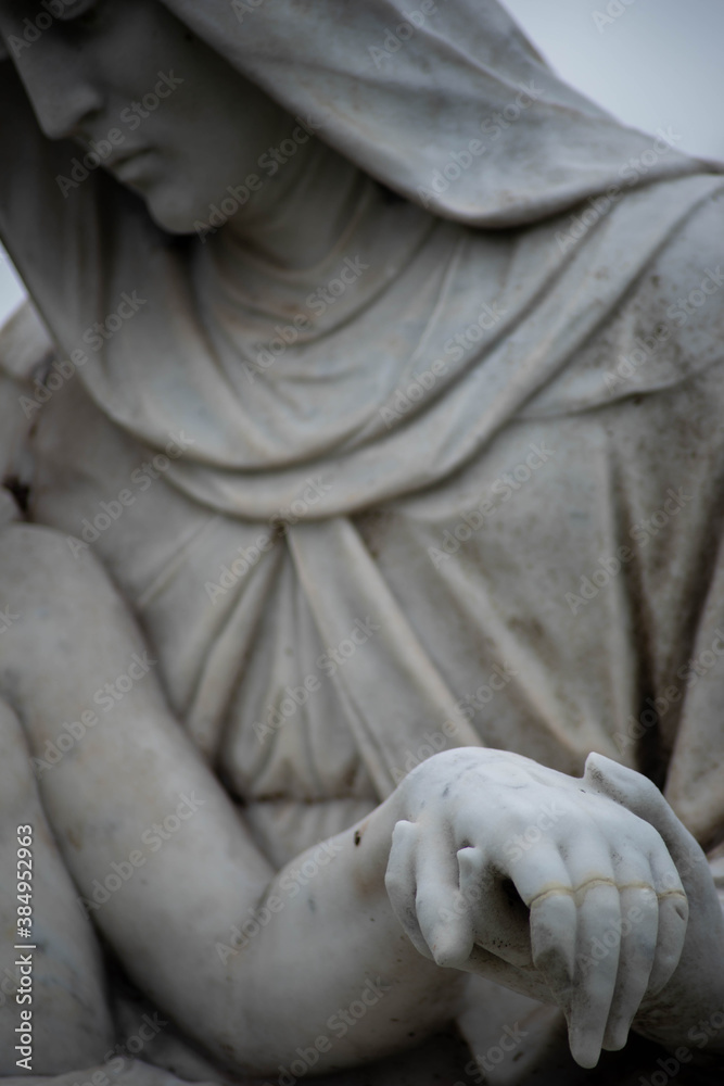 Beautiful stone pieta in a Victorian cemetery. Full frame image in ...