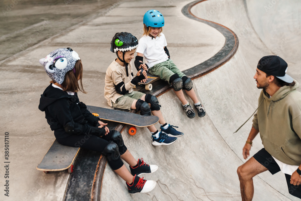 Smiling kids wearing safety gear Stock Photo | Adobe Stock