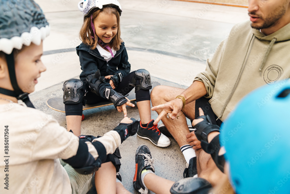 Smiling kids wearing safety gear Stock Photo | Adobe Stock