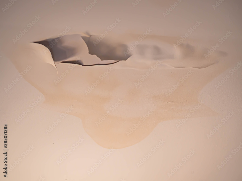 Abstract light brown background of bulging, swollen ceilling walls ...