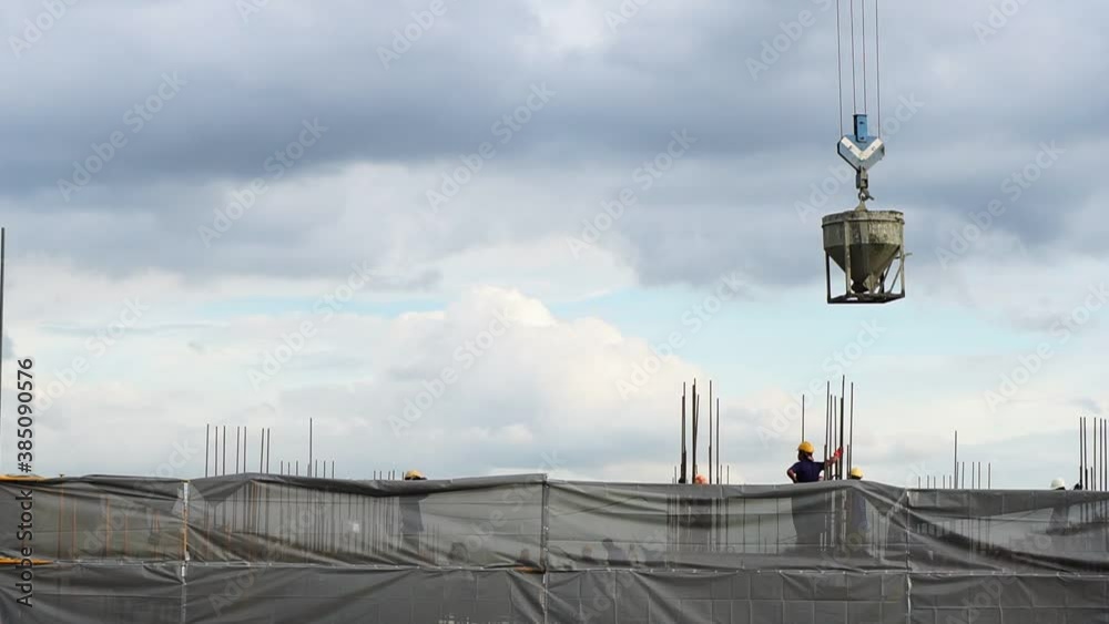 Working in a place where high-rise buildings are under construction and ...