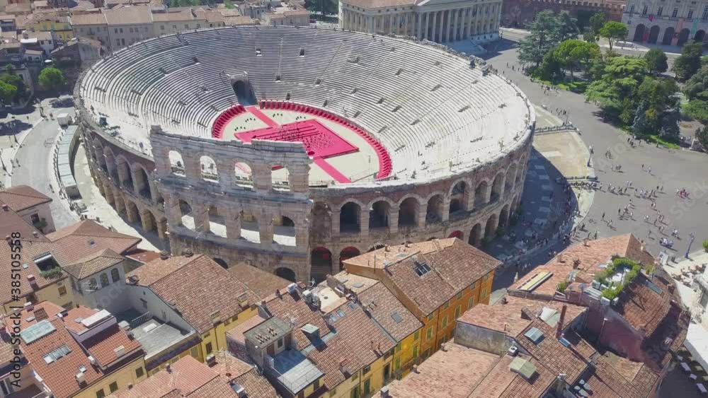 Aerial panoramic view of Arena di Verona, Italy. The drone flies from ...