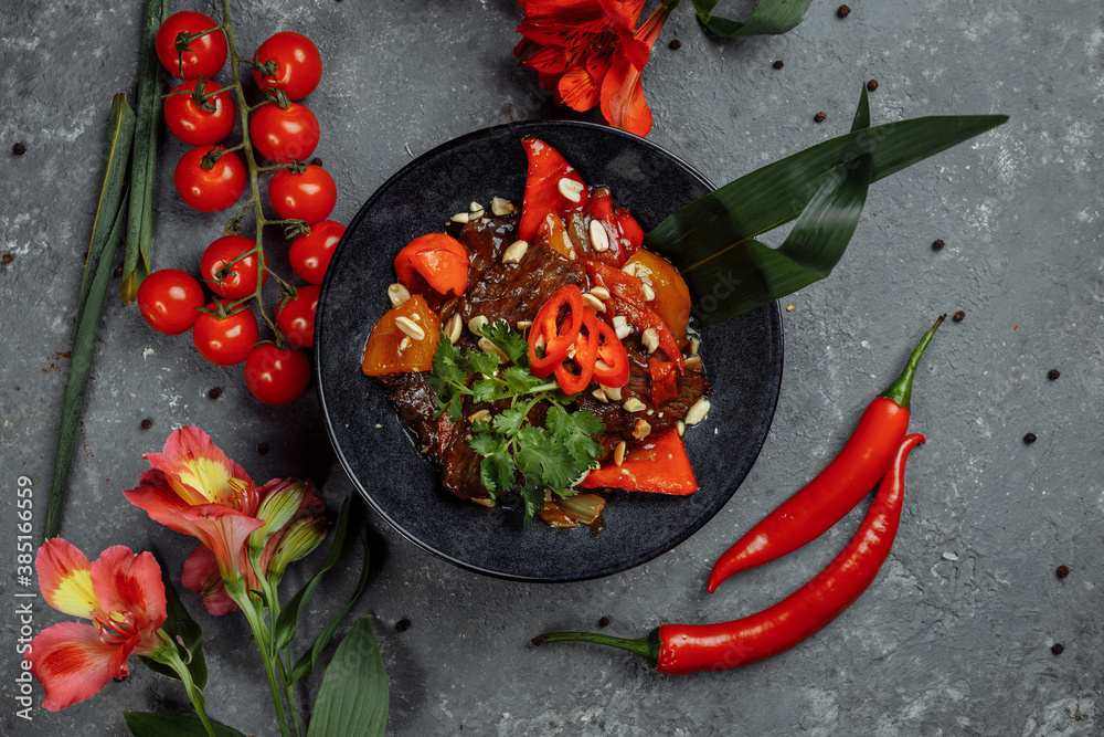 Beef wok. Traditional chinese mongolian beef stir fry in chinese cast ...