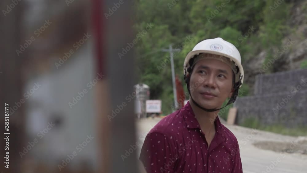 Good Looking Filipino Engineer Wearing Safety Helmet Staring At His ...