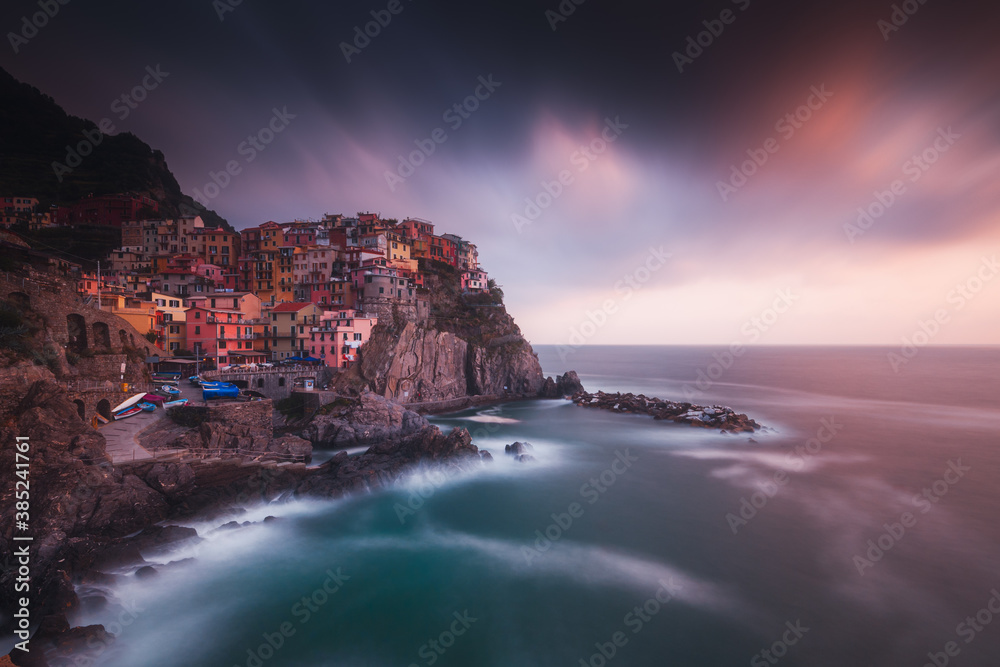 Cloudy sunset above Manarola, village in the heart of the cinque Terre ...