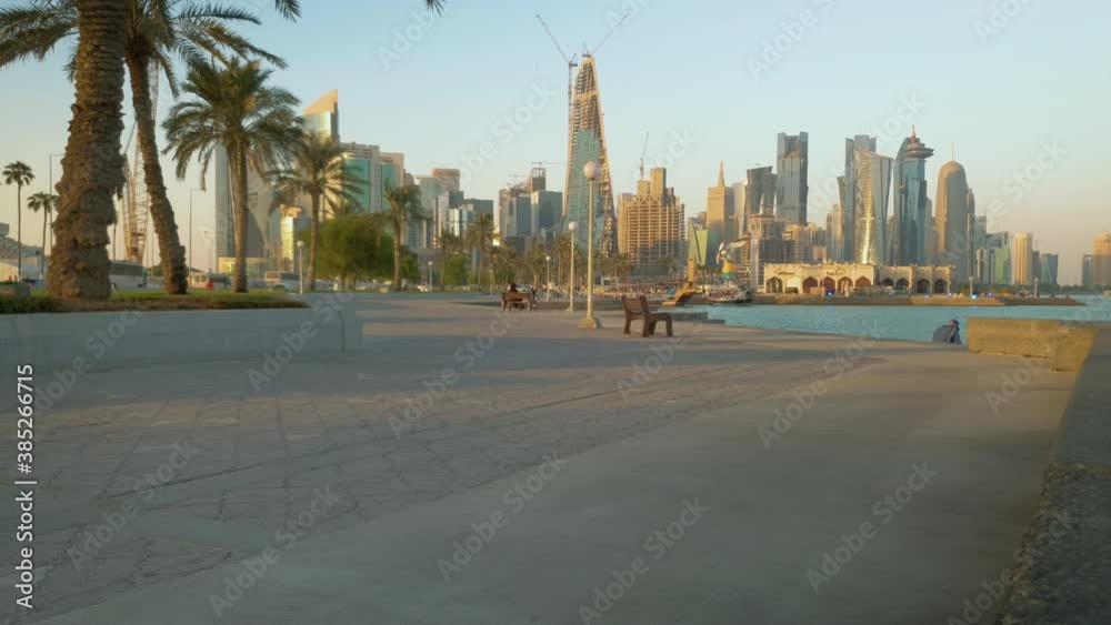 Doha corniche in Doha Qatar afternoon shot showing people walking ...