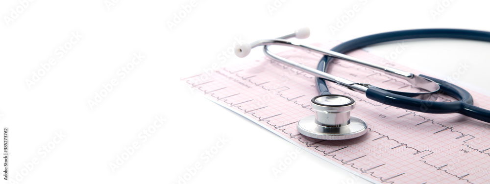 Blue Stethoscope on electrocardiogram (ECG) chart paper. ECG heart ...