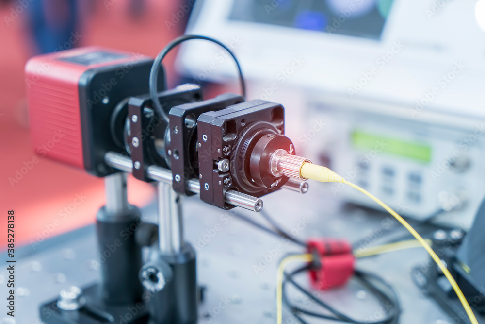Experiment with laser device in optical laboratory Stock Photo | Adobe ...