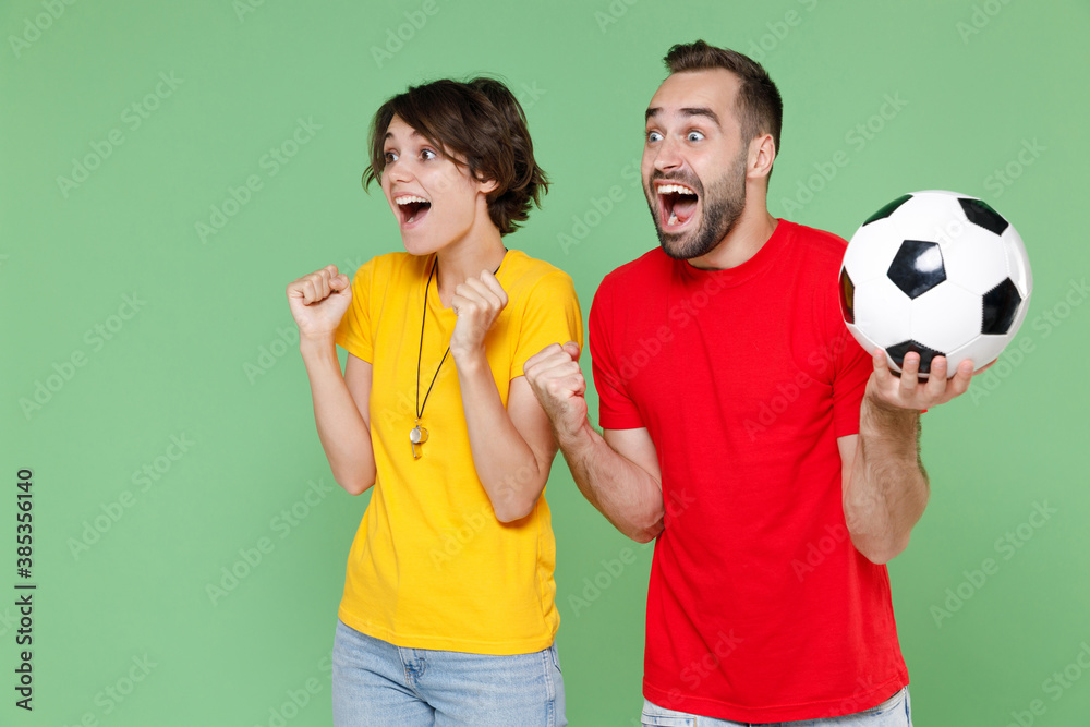 Amazed happy couple friends sport family woman man football fans in ...