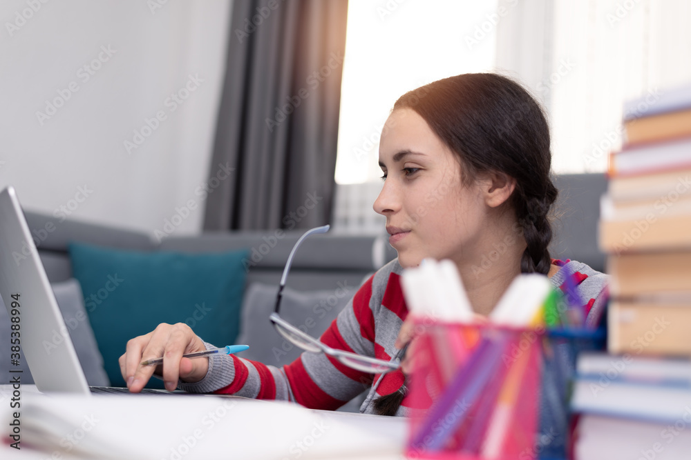 Social distancing student concept, education at home. High school girl ...