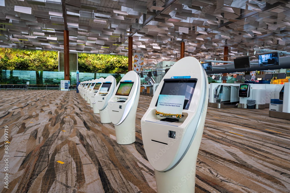 Singapore - October 2020: Self check in kiosk at Singapore Changi ...