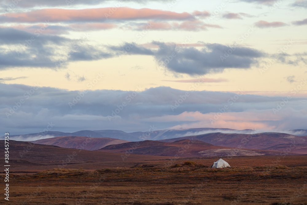 Picturesque autumn arctic landscape. Yaranga of reindeer herders in the ...