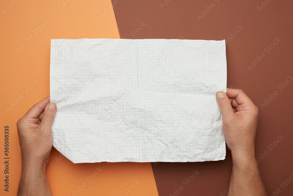 Male Hands Crumpling Paper