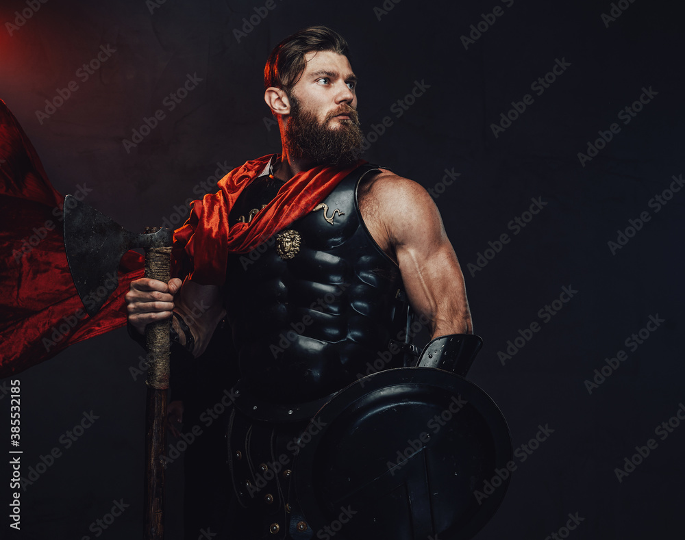 Atmospheric and dark room with spotlight and roman guardian with ...