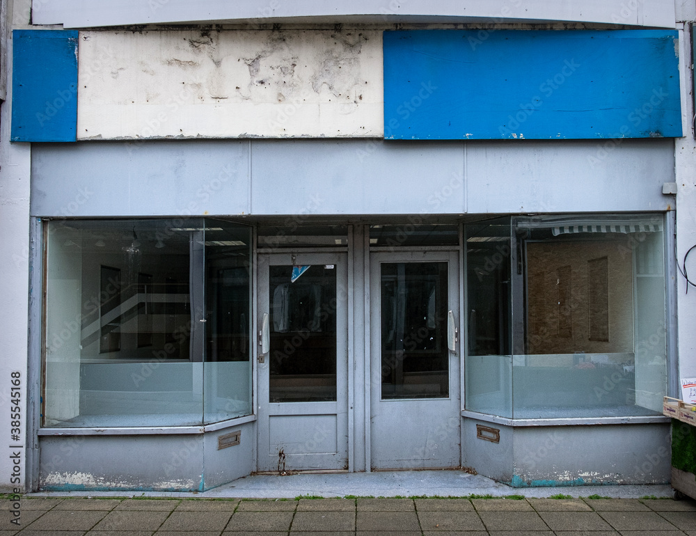 Shops closed and empty depicting the dying high street in the UK. Stock ...