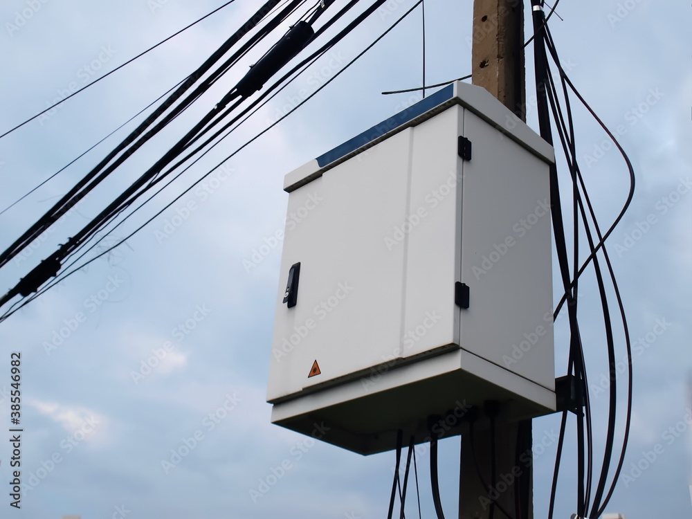 Internet control cabinet on a pole. NODE is a box that combines the ...