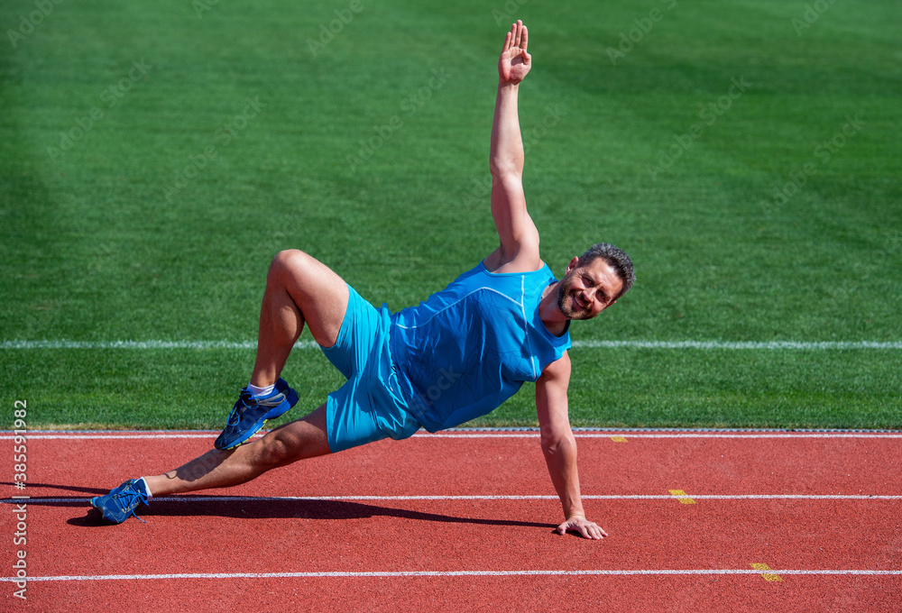 Happy and sporty. male athlete do morning exercise. warm up workout ...