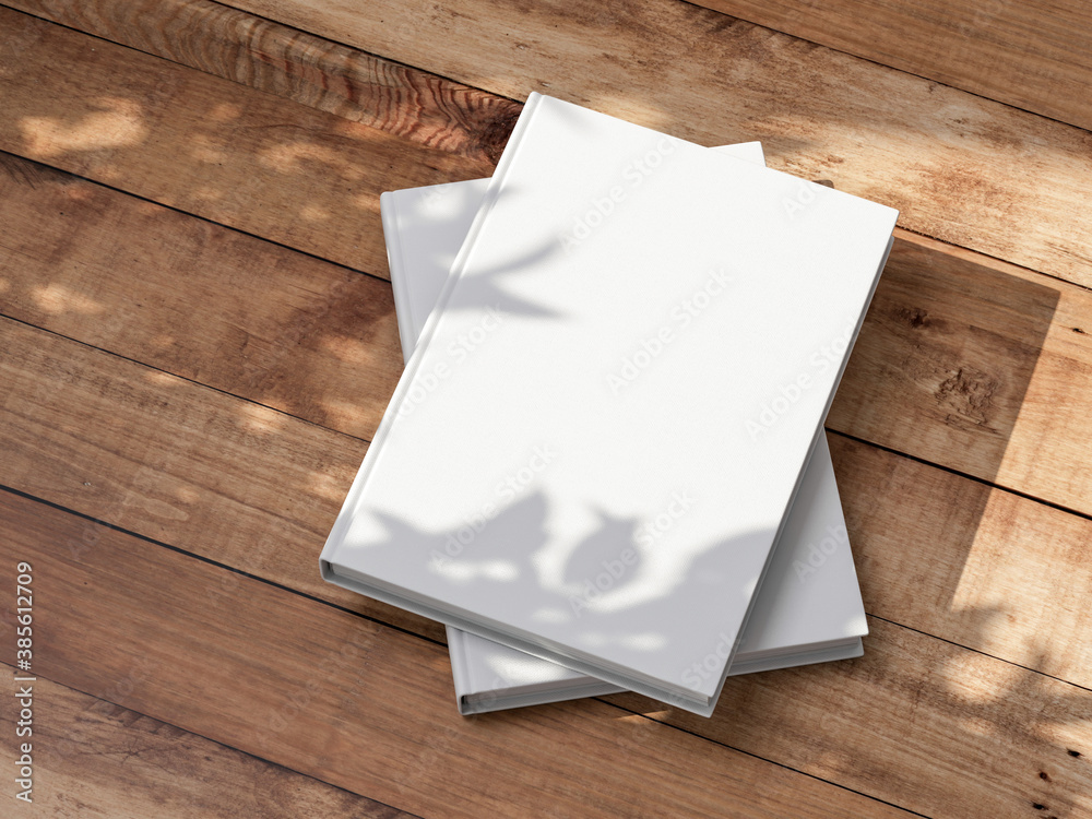 Two White Books Mockup with textured hardcover on wooden table outdoors ...