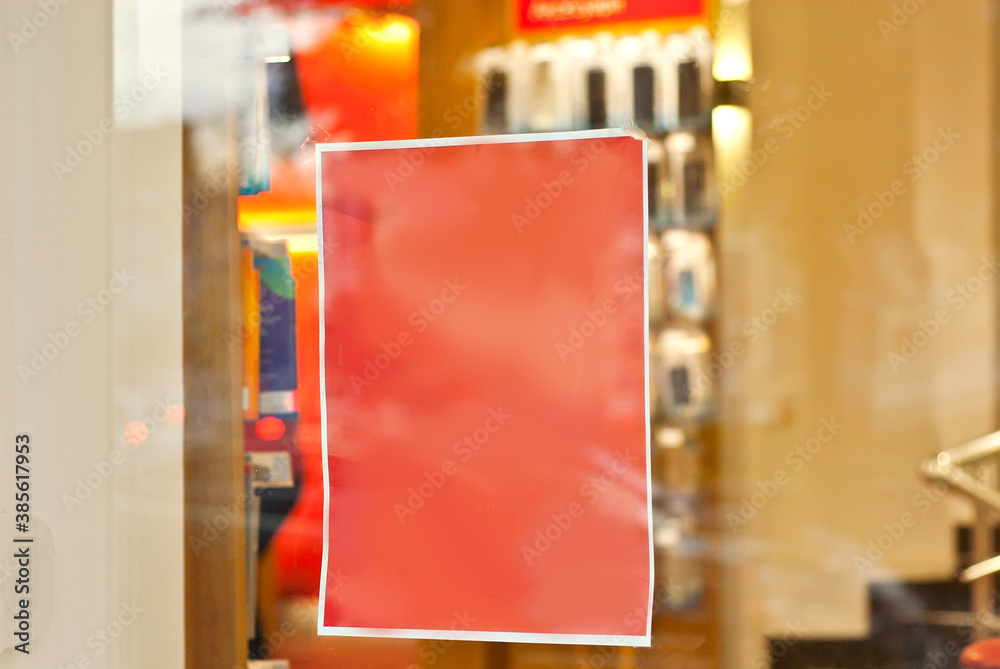 Banner for advertising in a shop window. Sign Board behind the glass ...