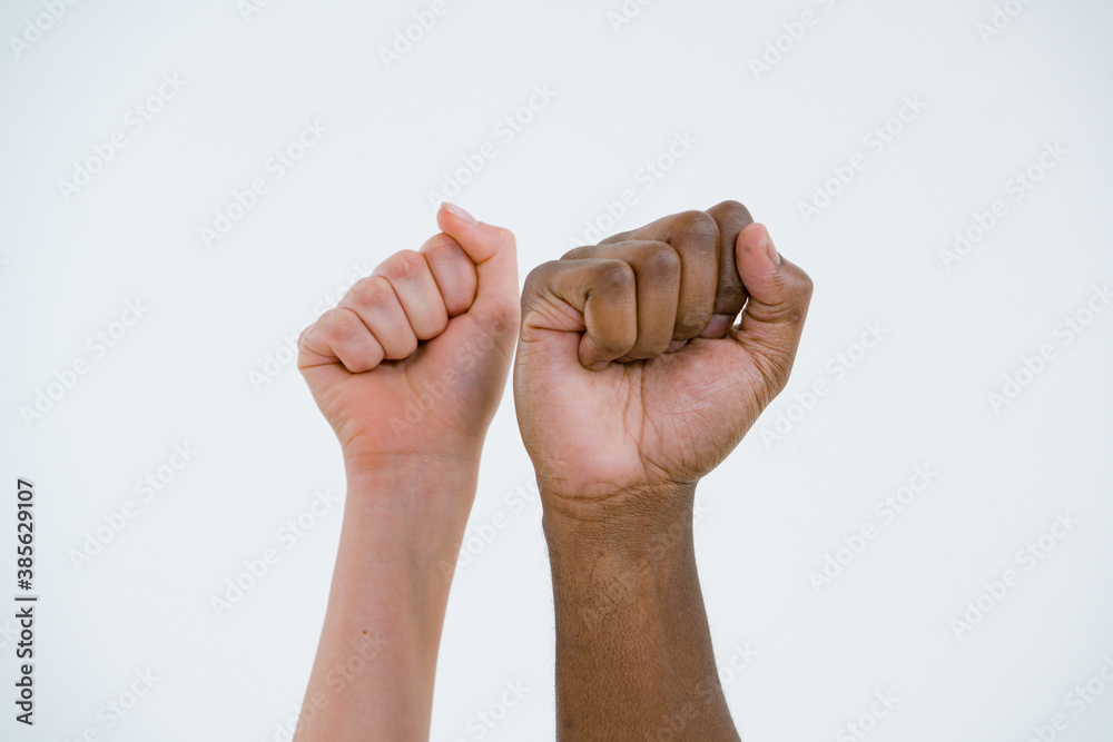 Black lives matter. Hands of white and black people during a protest ...