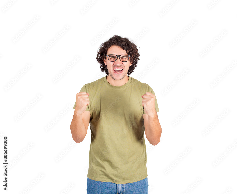 Contented young man, long curly hair style, celebrates success ...