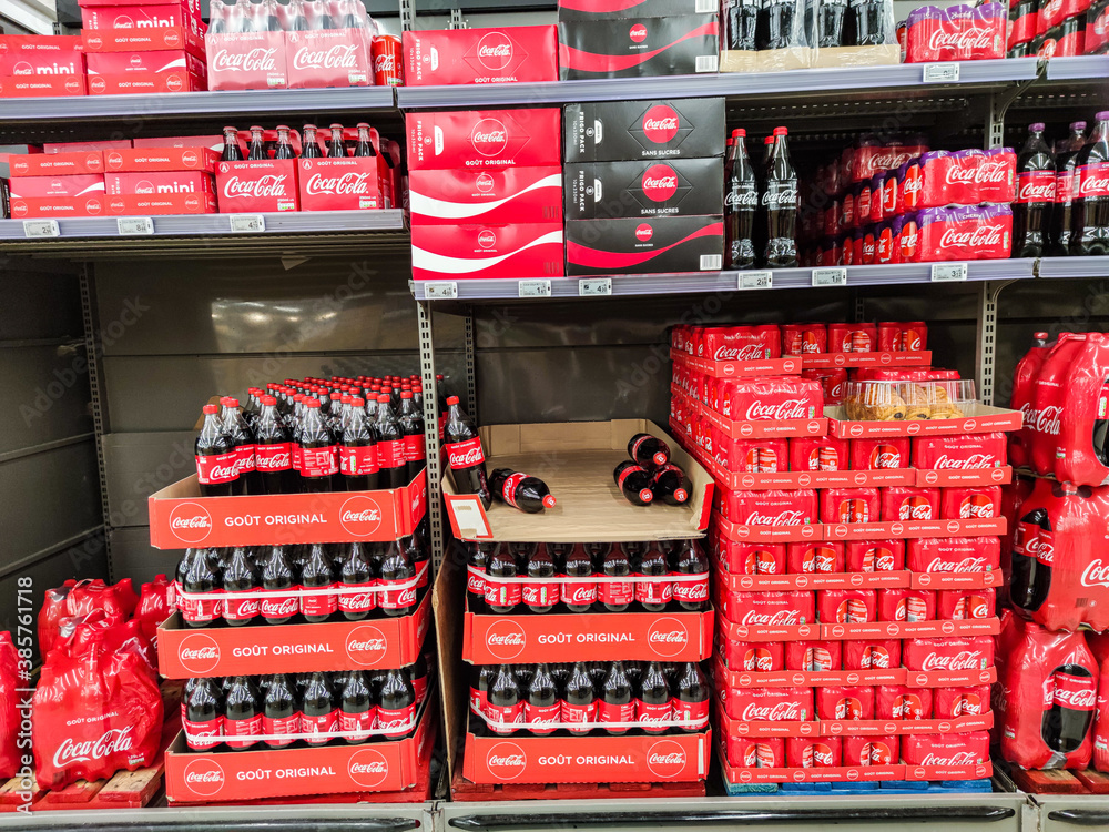 Boxes with Coca-Cola bottles in an French supermarket Stock Photo ...