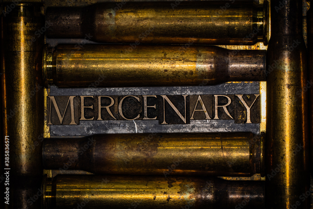 Mercenary text message on lead bar between copper 50 caliber gun ...